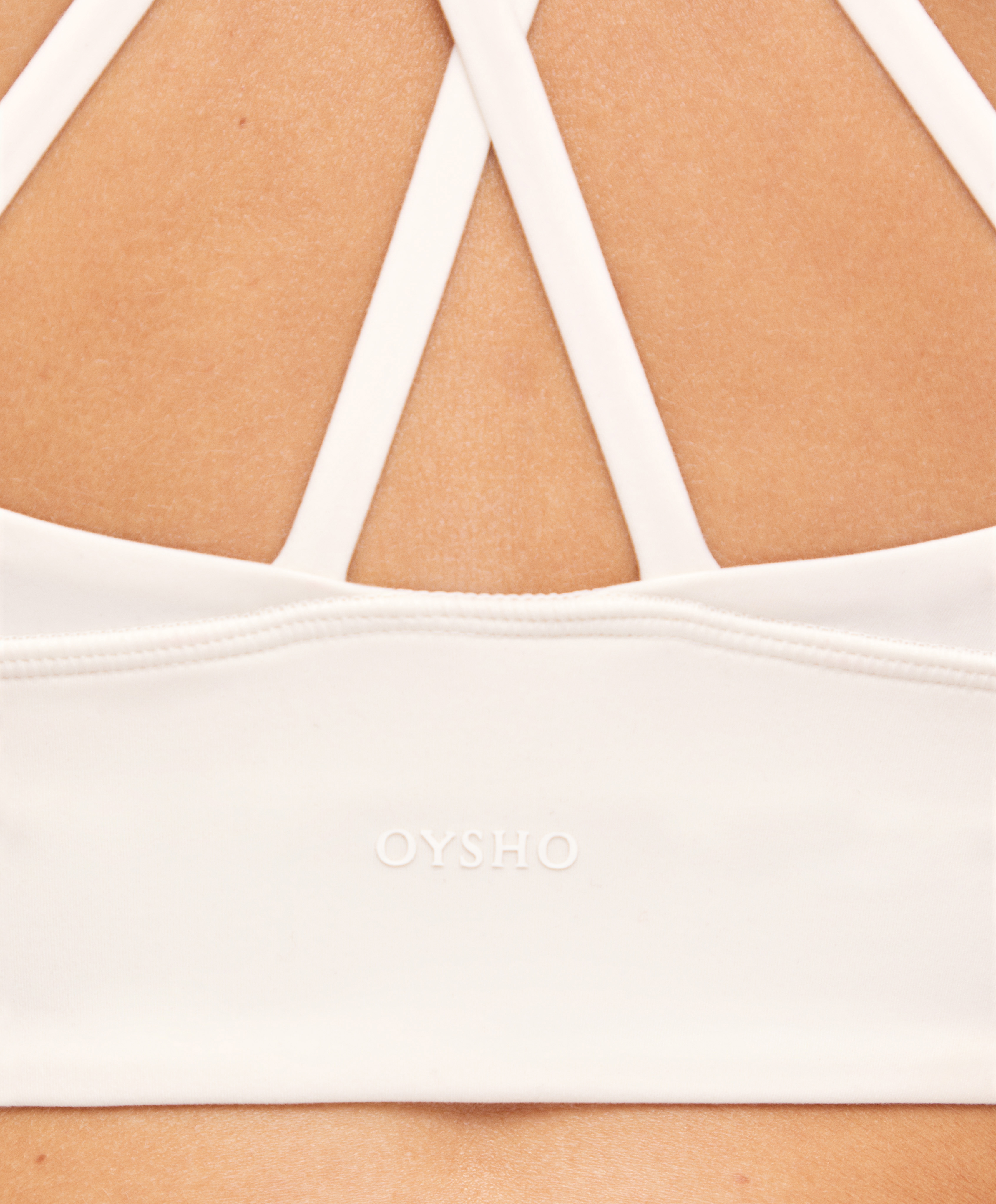Medium-support sports bra with cups | OYSHO THAILAND