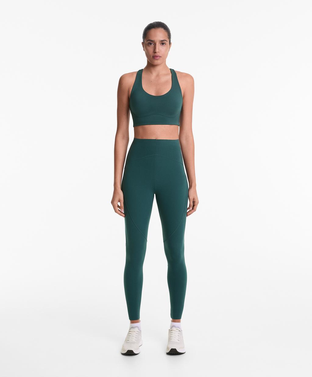 Green basic compressive total look. | OYSHO Hungary