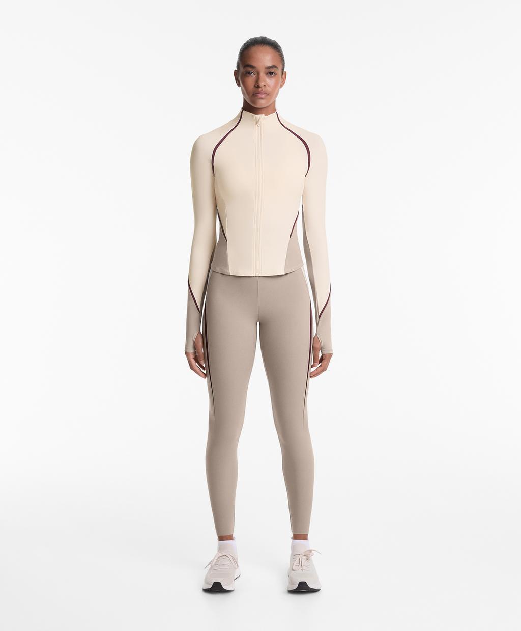 Light warm technical running jacket with piping | OYSHO Singapore